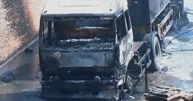 Gas truck crash in China sparks fire, kills 20 - CBS News