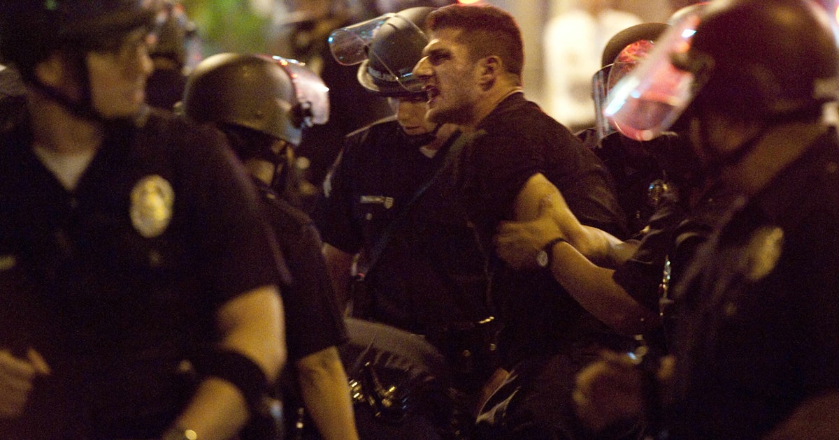 L.A. riot police clash with protesters near Art Walk - CBS News