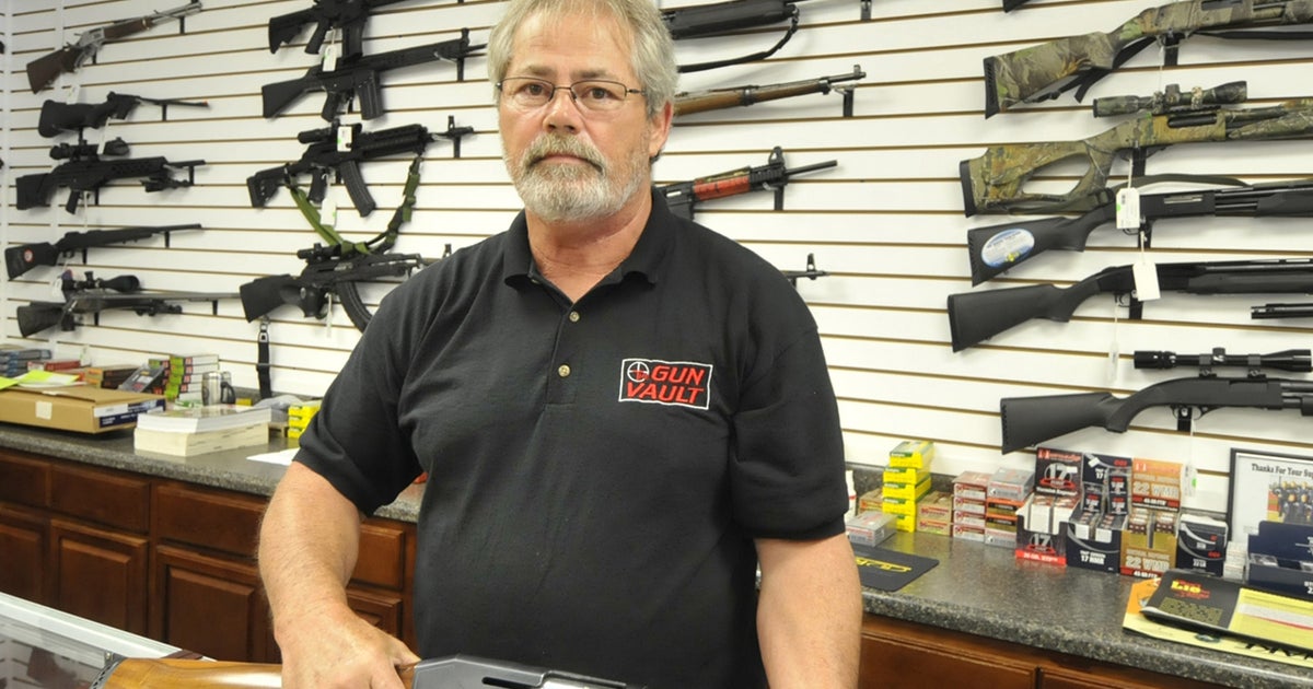 Gun sale background checks spike after Aurora - CBS News