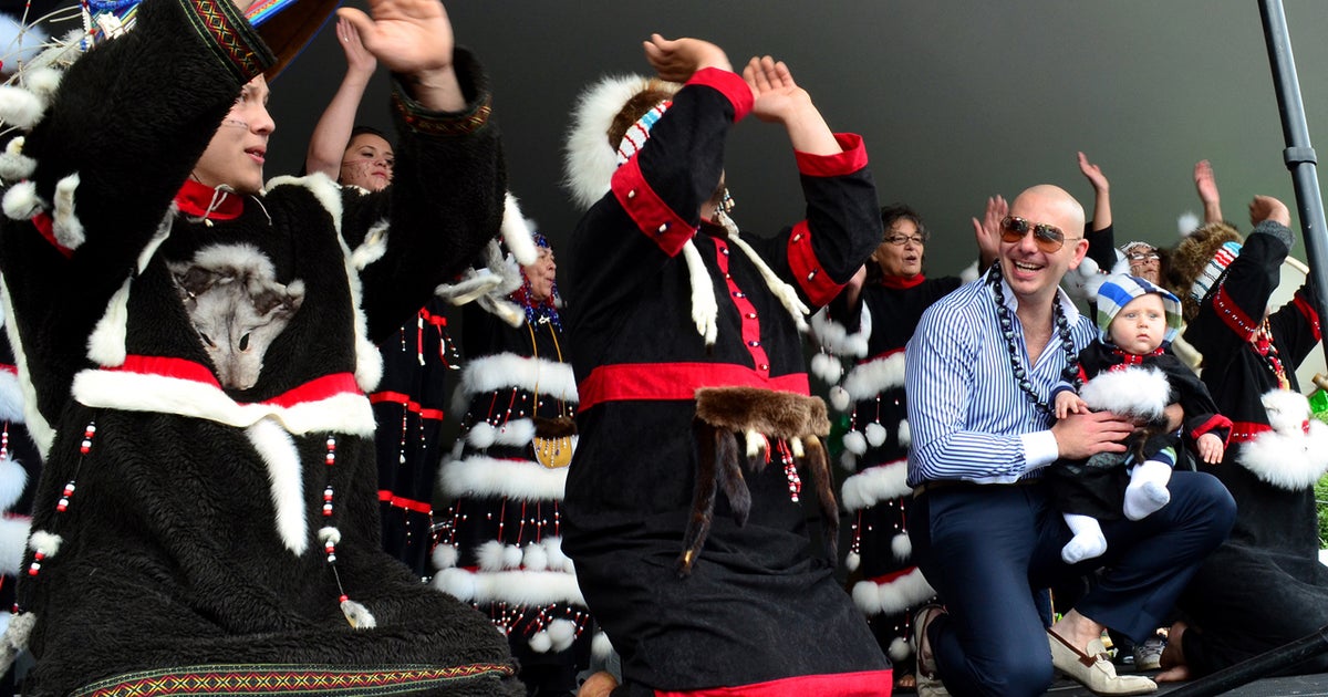 Rapper Pitbull visits Alaska, gets bear spray - CBS News