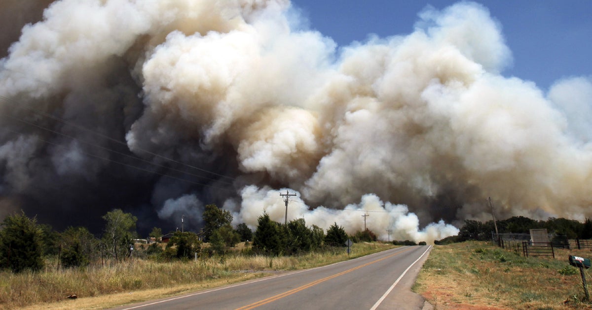 More than 100 buildings burn in Okla. wildfires - CBS News