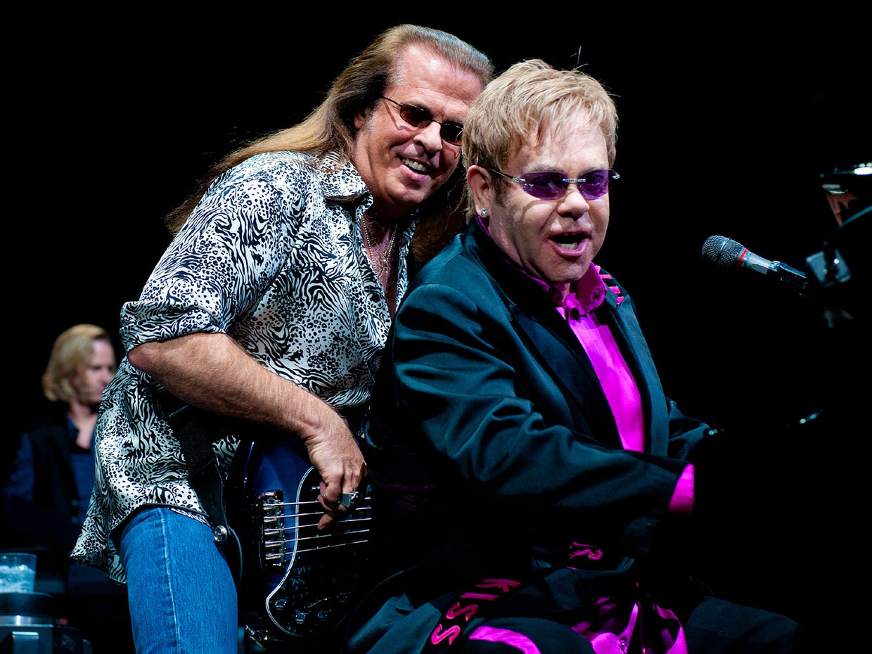 Elton John devastated by death of longtime bassist - CBS News