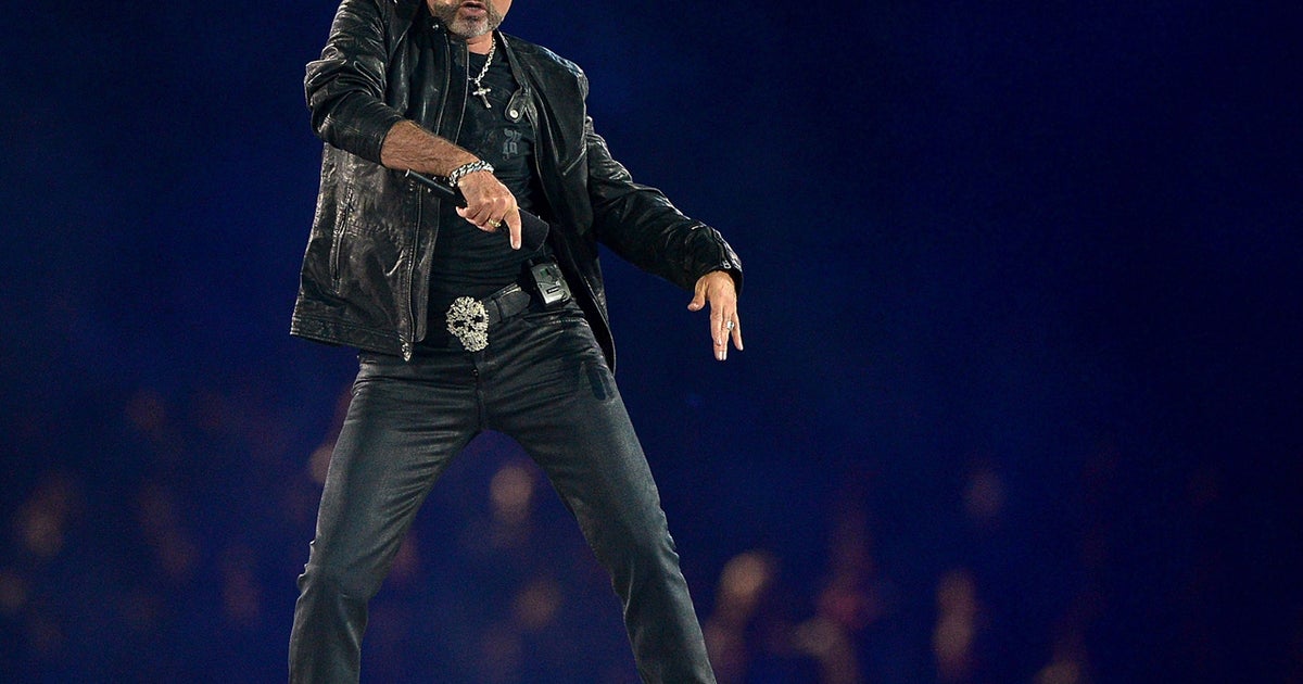 George Michael pays tribute to doctors at Vienna concert - CBS News