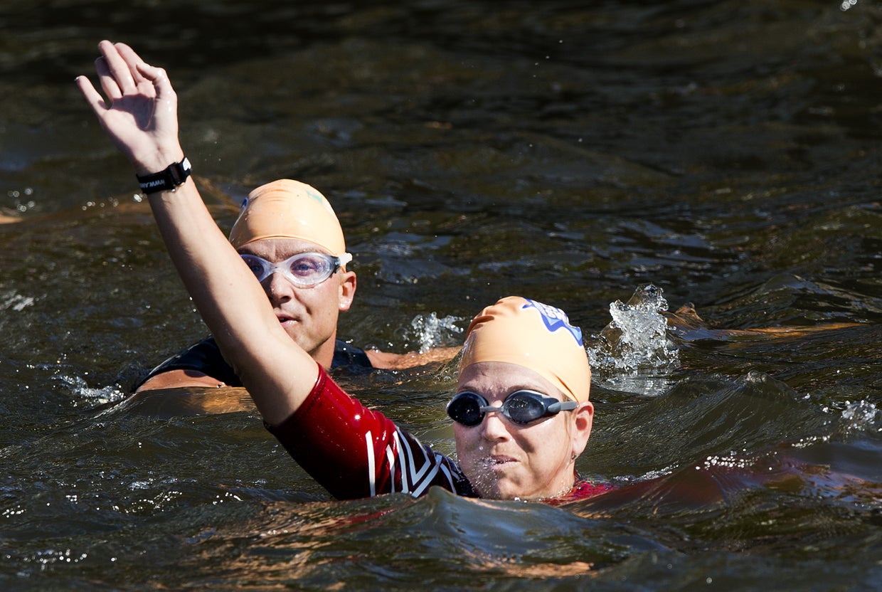 Dutch princess swims Amsterdam canals for charity - CBS News