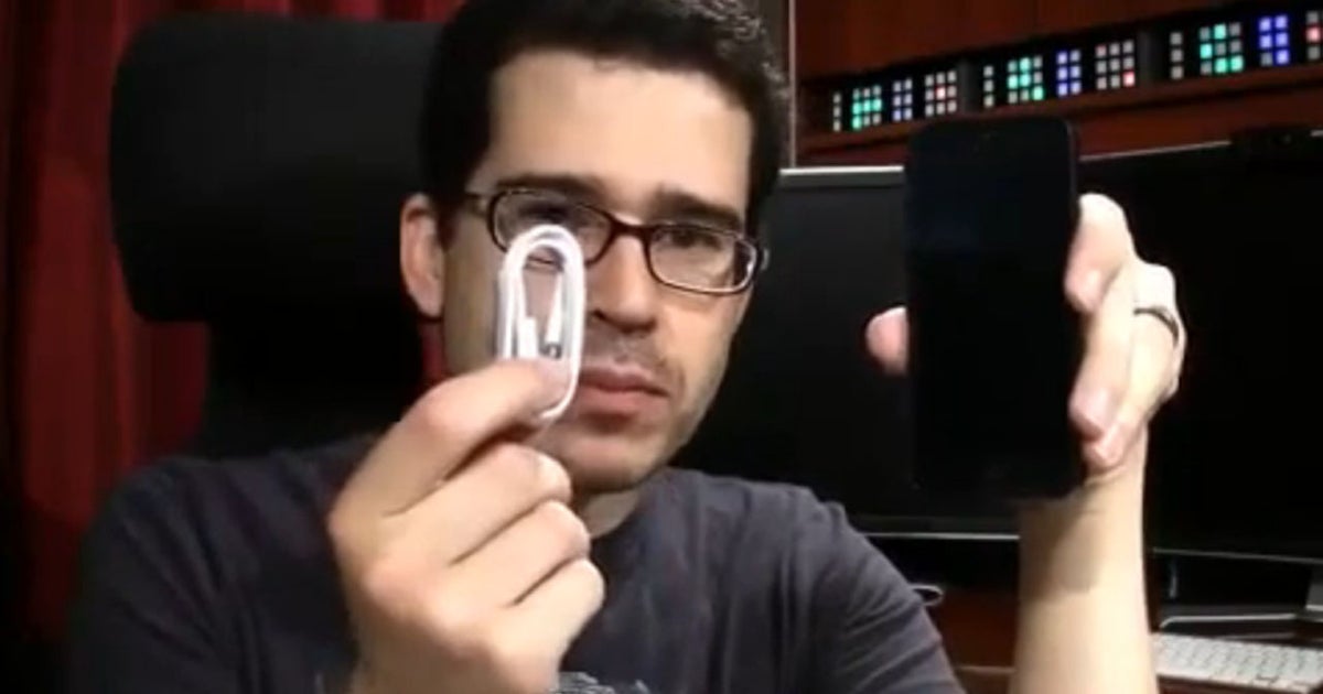 Watch: People acting irrationally to an iPhone 5 - CBS News