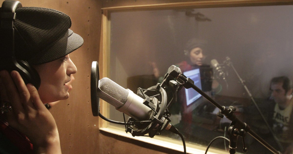 First female rapper takes stage in Afghanistan - CBS News