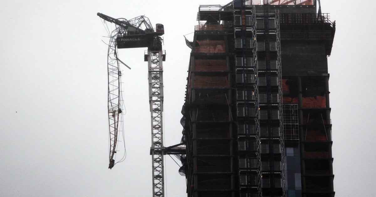 Crane dangles from NYC high-rise as Hurricane Sandy bears down on city ...
