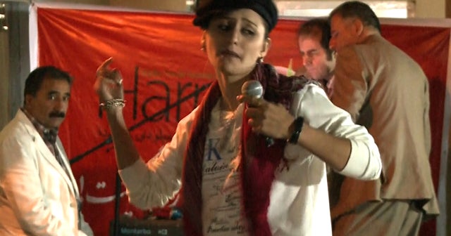 Afghan woman challenges convention through rap - CBS News