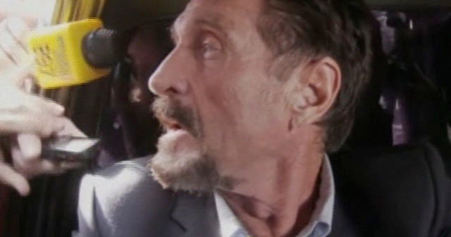 John McAfee released in Guatemala, lands in Miami - CBS News