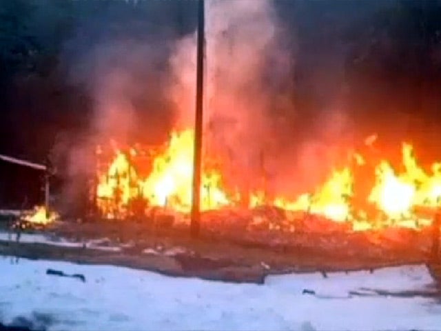 Christopher Dorner Manhunt: Charred body found in burned cabin, police ...