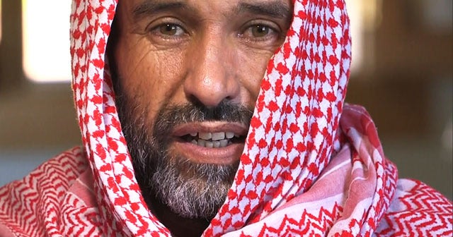 Syrian rebel leader confronted with video of his men killing prisoners ...