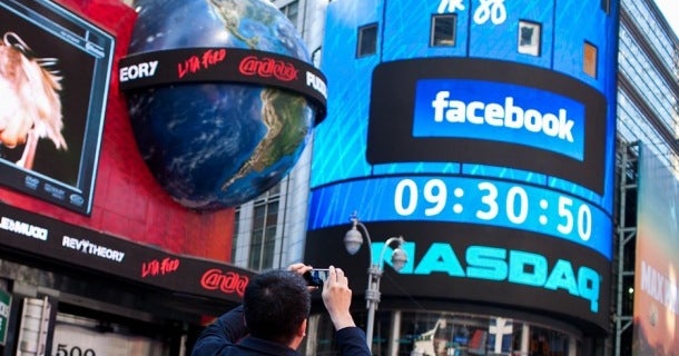 Facebook shares close above $40 for first time - CBS News