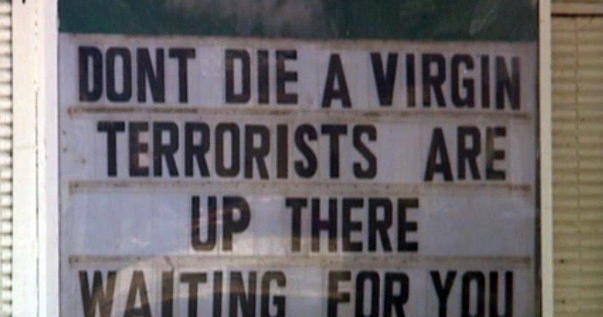 "Don't die a virgin" sign stops traffic at gas station - CBS News