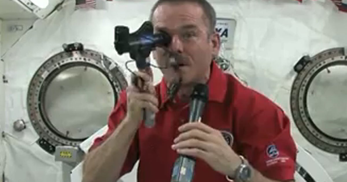 Watch: How to give yourself an eye exam in space - CBS News