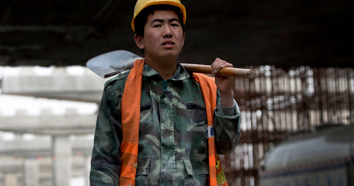Chinas Economic Growth Slows In First Quarter Cbs News