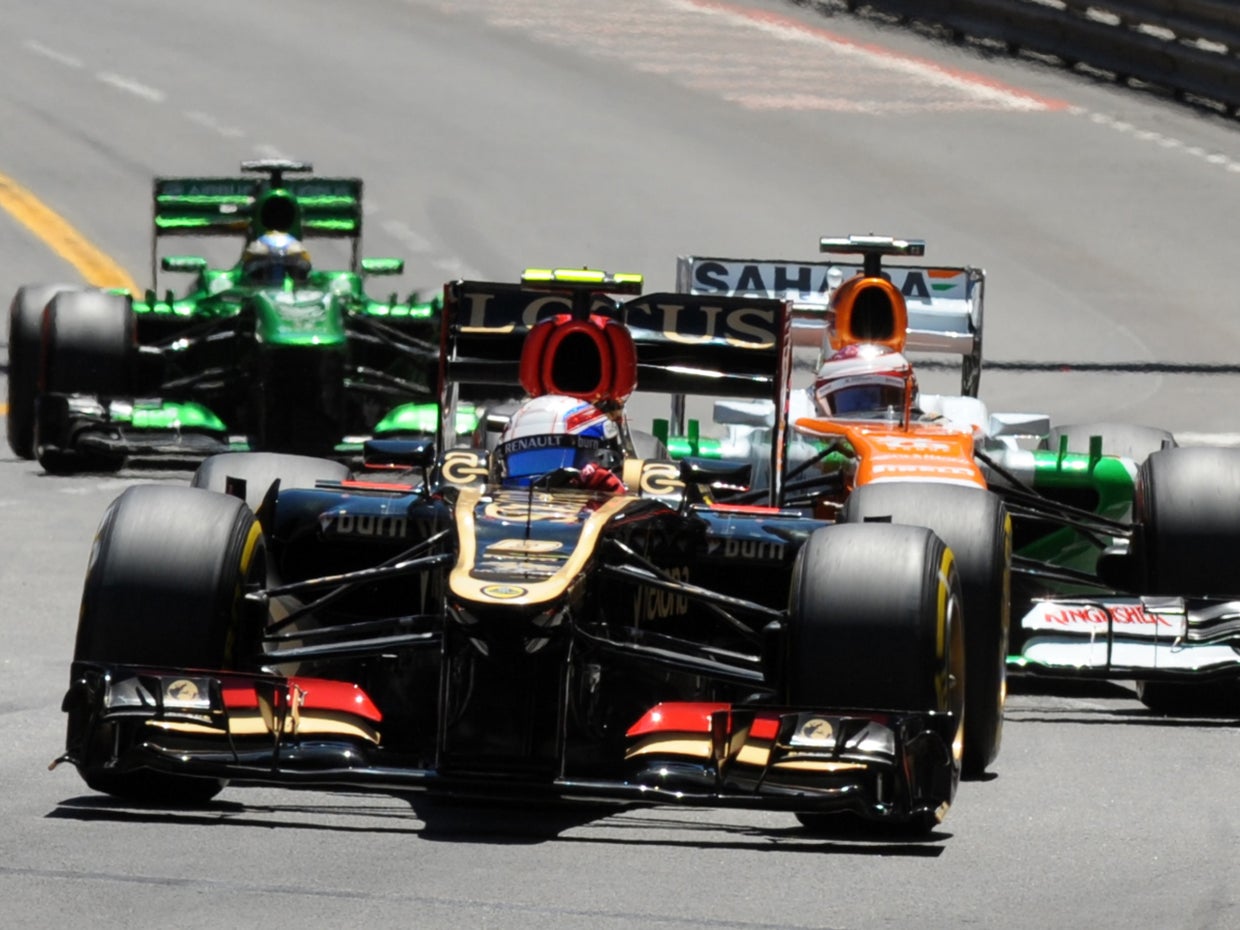 Daft Punk members unveil new F1 race car that kind of looks like them ...