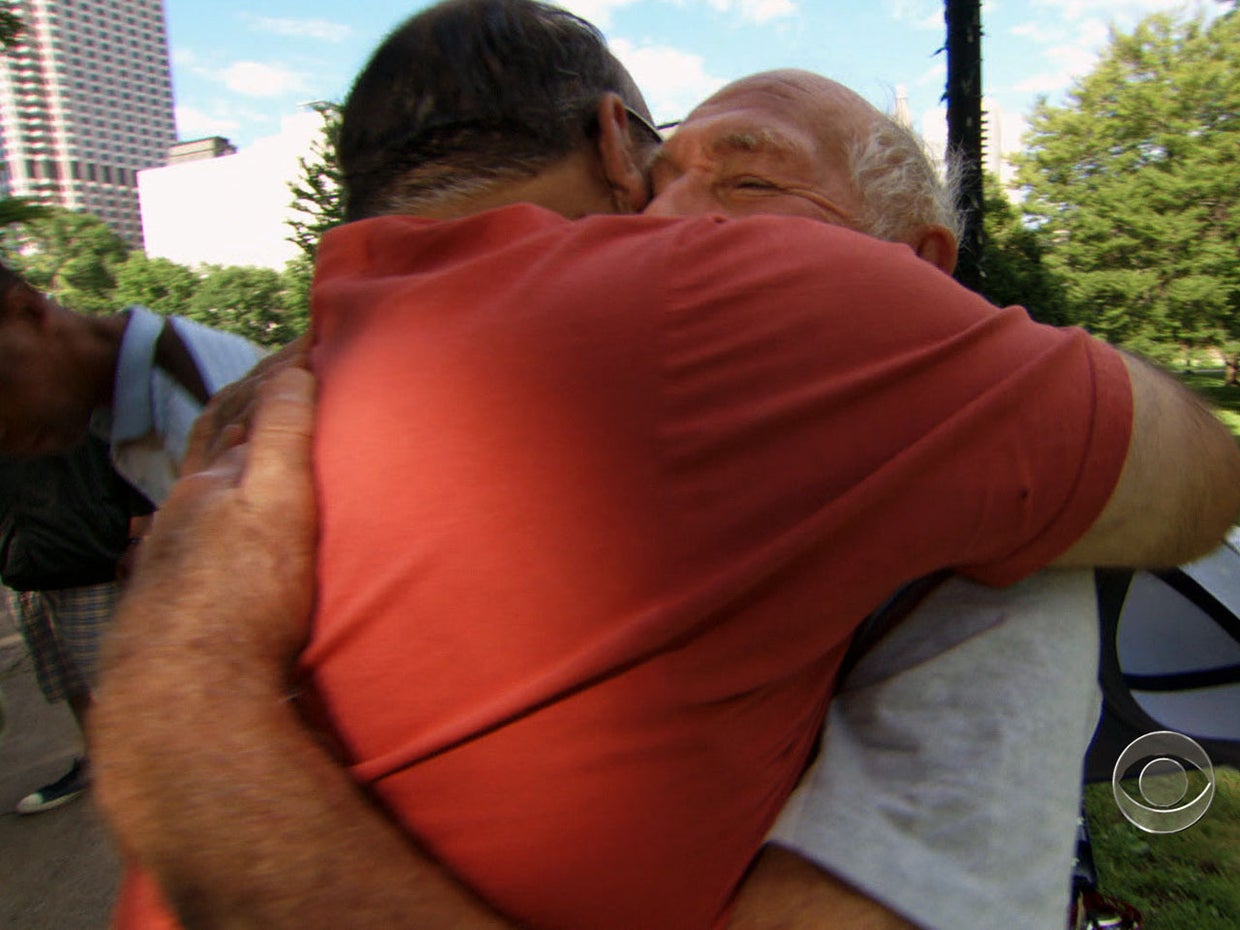 Homeless pay for haircuts with hugs in Conn. town - CBS News
