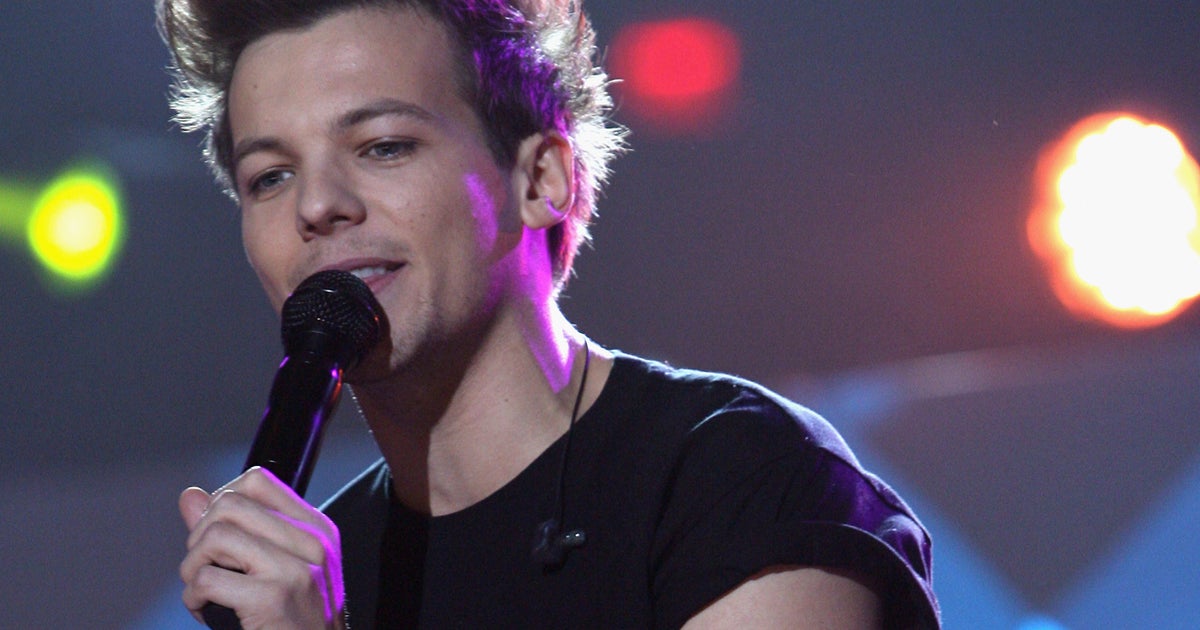 One Direction's Louis Tomlinson joins soccer team - CBS News