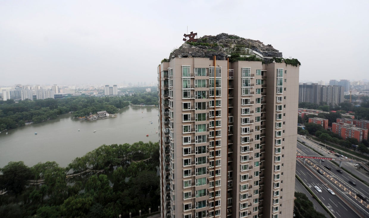 CBS News checks out controversial villa on top of Beijing building ...