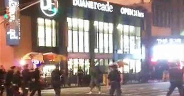 Bystander video shows chaotic scene in Times Square-area shooting - CBS ...