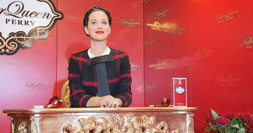 Katy Perry arrives to fragrance launch on a motorcycle - CBS News