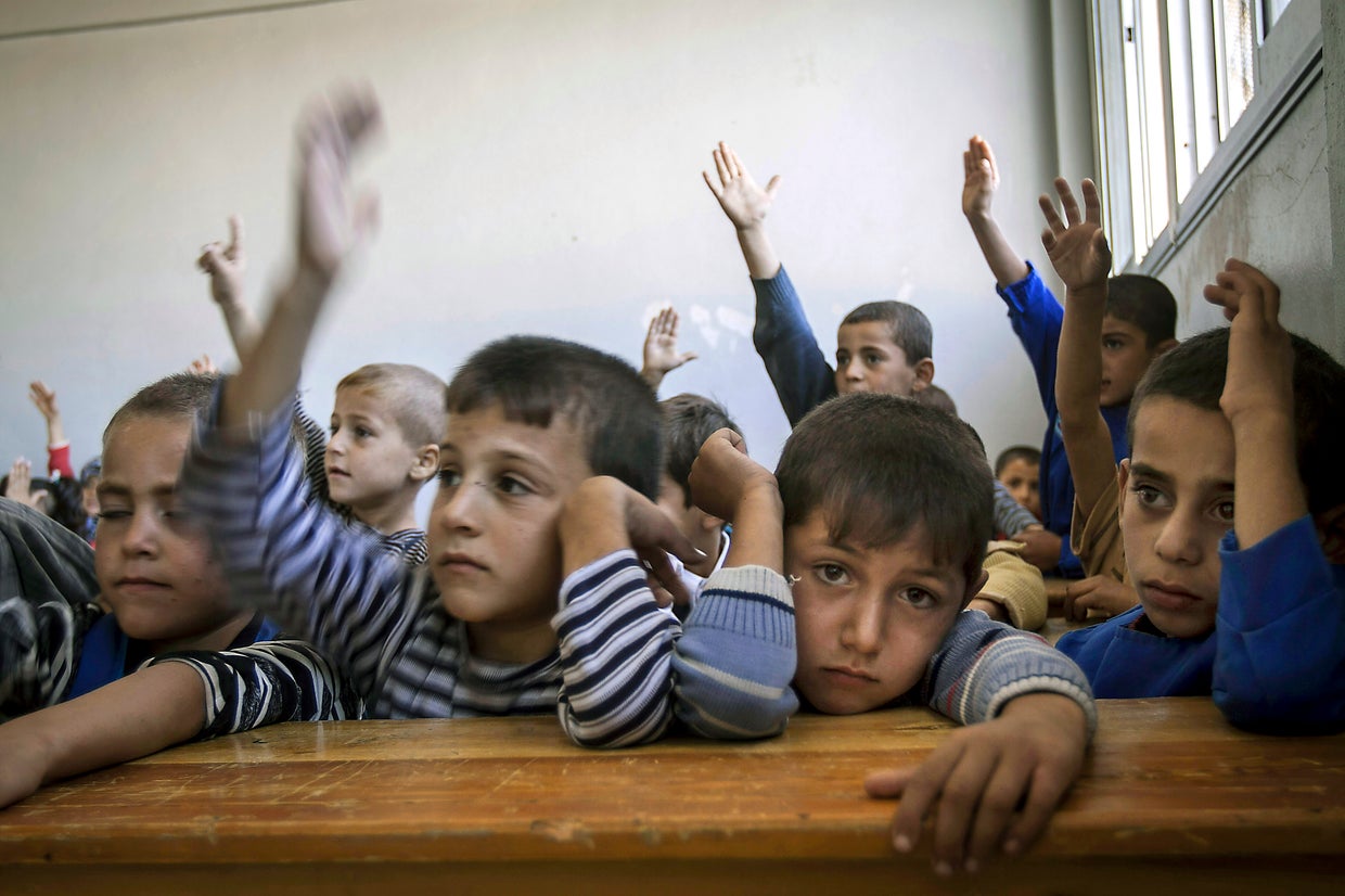 Back to school for some young Syrians