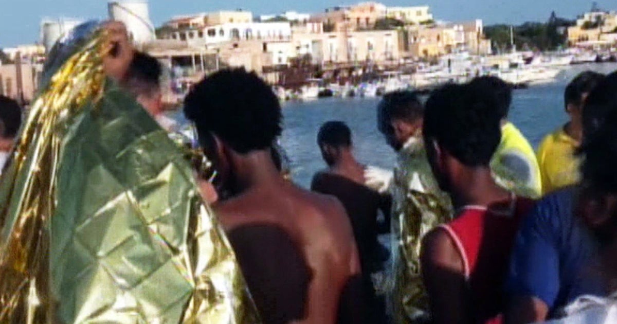Boat packed with 500 African immigrants catches fire, sinks - CBS News