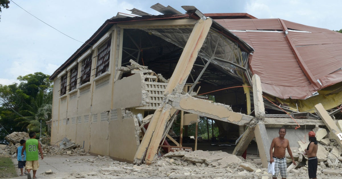 Few survivors pulled from rubble of Philippines quake - CBS News