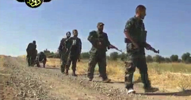 Video shows Iran aiding Syrian regime's fight against rebels - CBS News