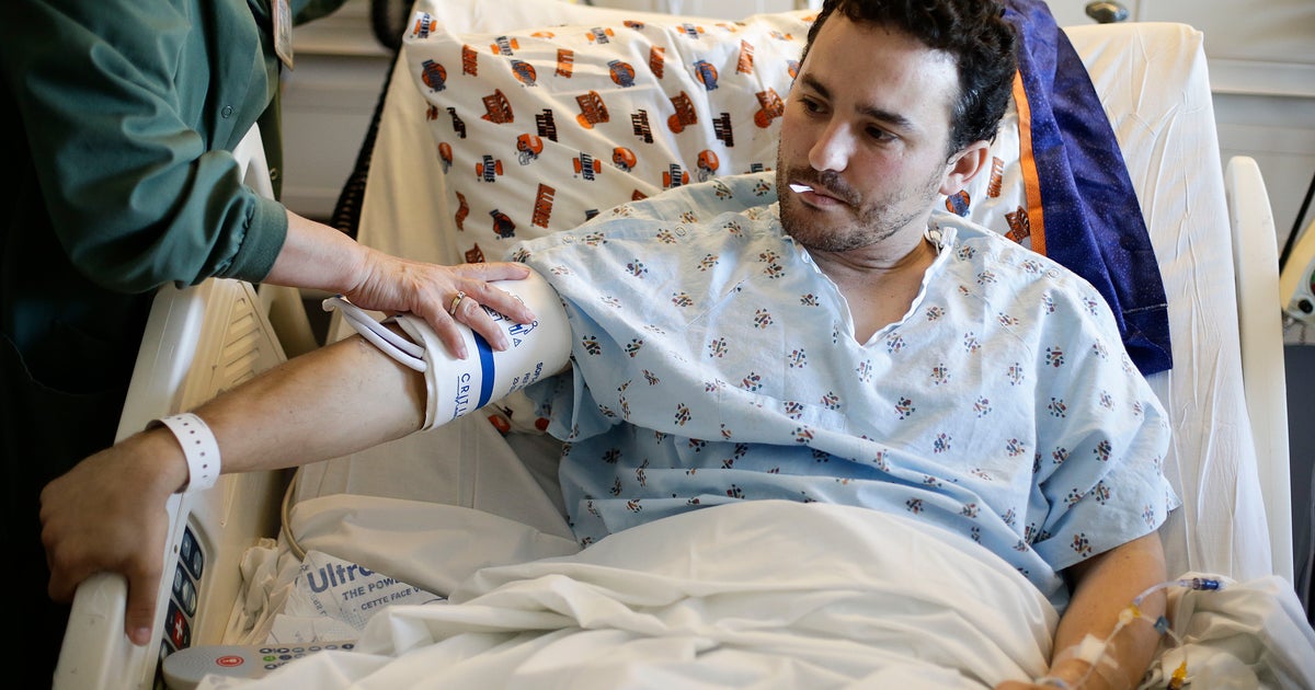 LAX shooting survivor says he crawled for his life - CBS News