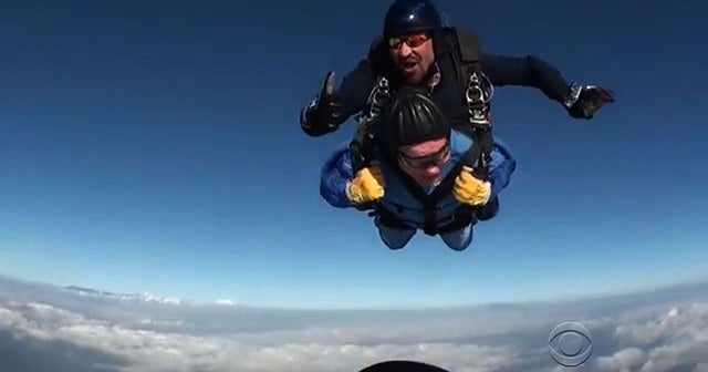 100-year-old celebrates birthday with first skydive - CBS News