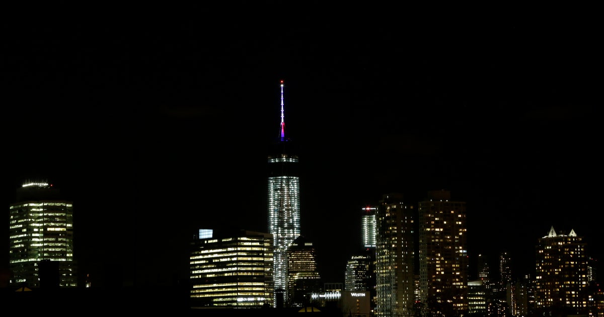 Spire, beacon of 1 World Trade light up NYC - CBS News