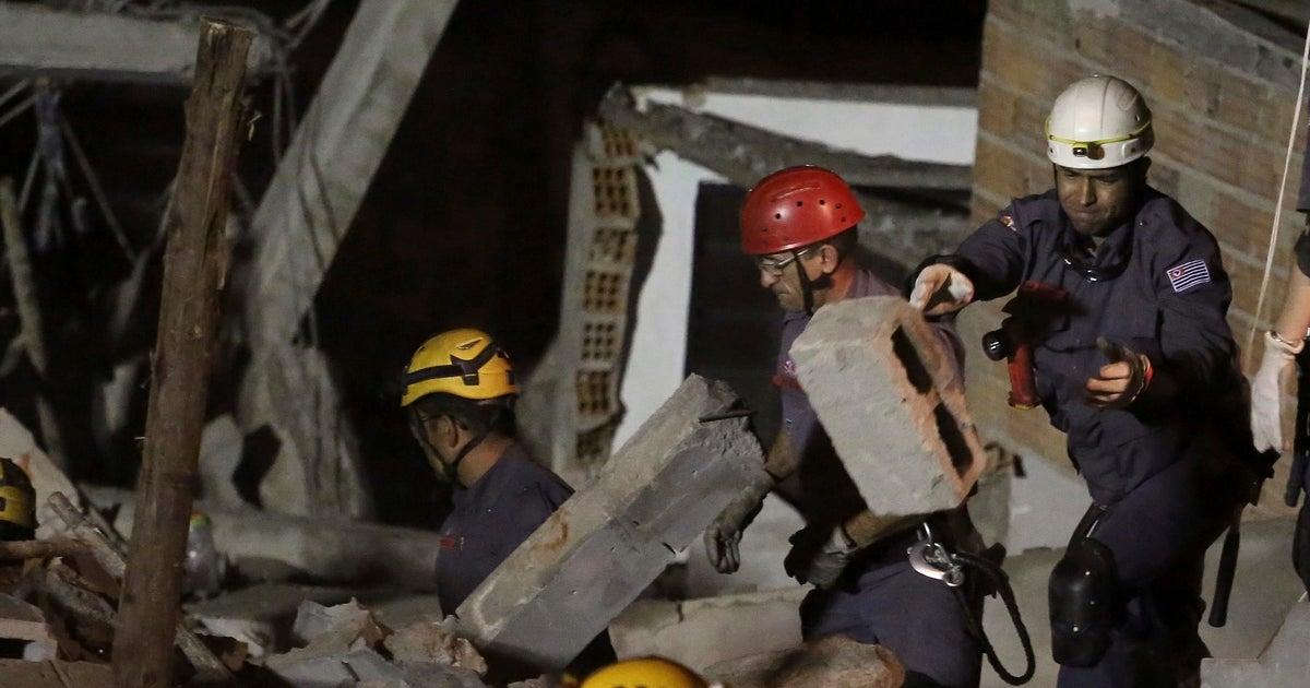 Building under construction collapses in Brazil - CBS News
