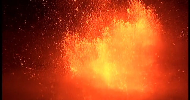 Mt. Etna volcano erupts, new crater splits open - CBS News