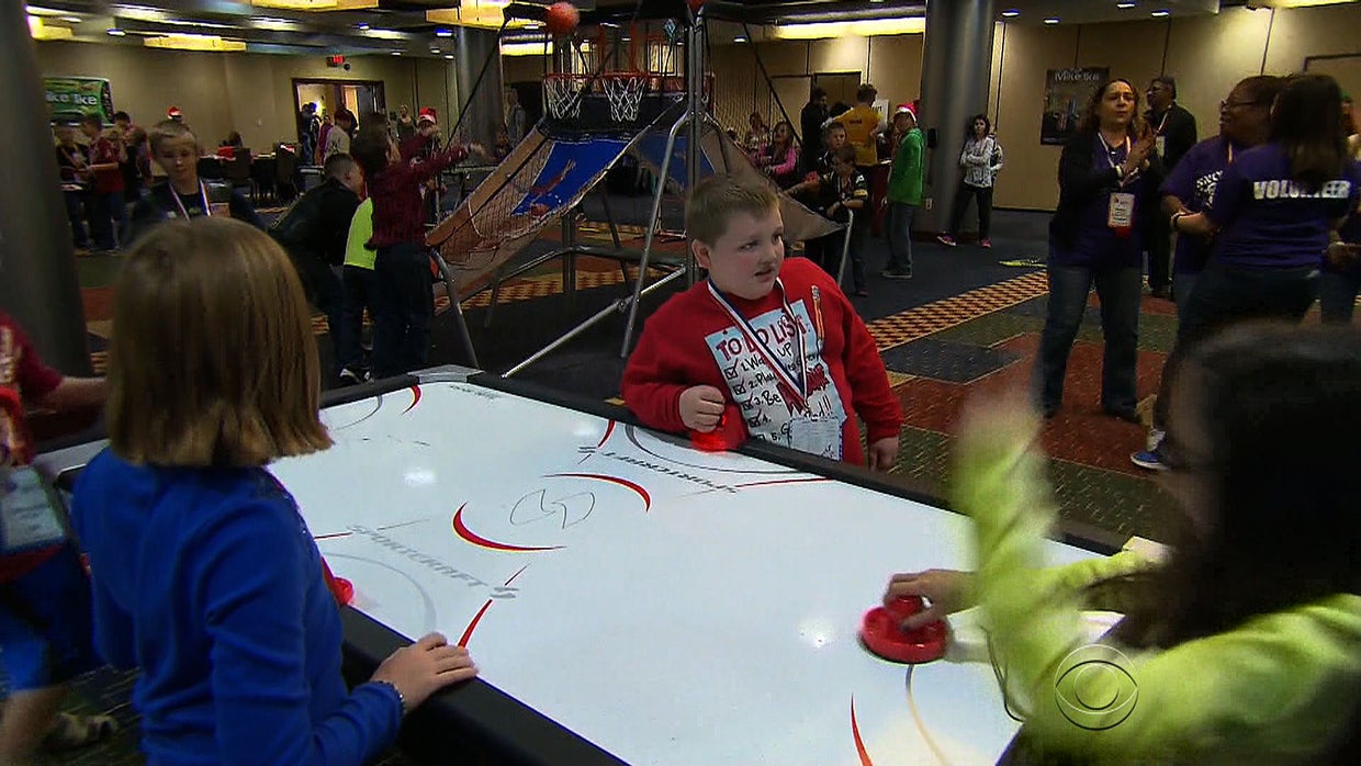 Speeding joy to children aboard the Snowball Express - CBS News
