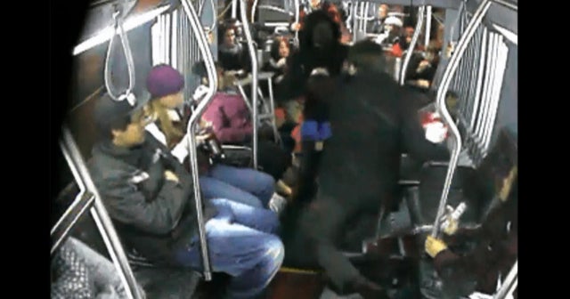 Bus passenger fights back against would-be robber - CBS News