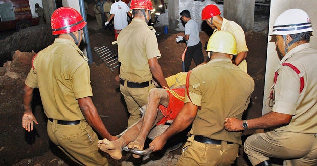 Building collapse in India kills at least 14 workers - CBS News