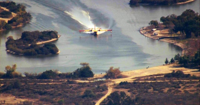 Watch: Calif. wildfire water bombers take on thousands of gallons in ...