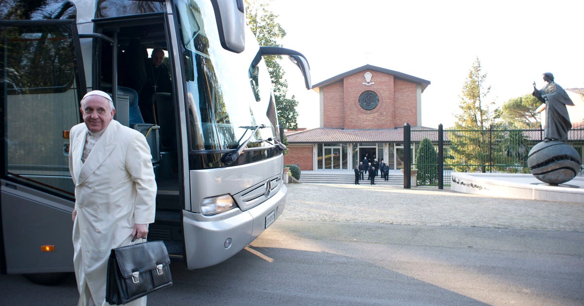 Pope Francis goes on retreat, takes the bus - CBS News