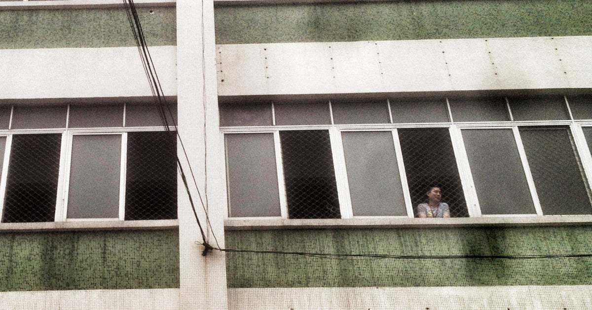 Chinese trade group to mediate shoe factory strike - CBS News