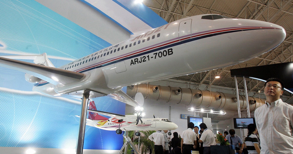 China's Comac set to deliver first passenger jets - CBS News