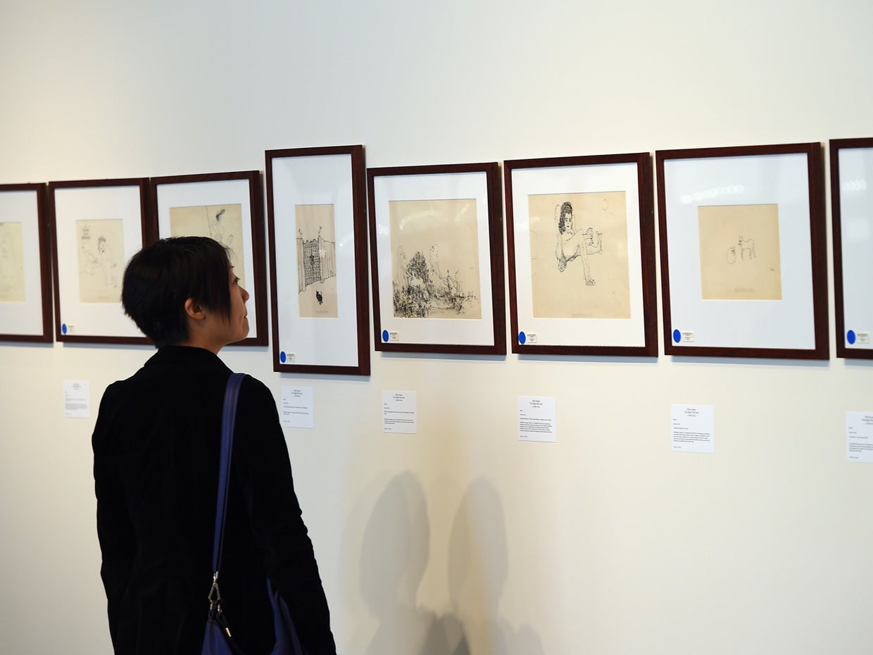 John Lennon drawings up for auction