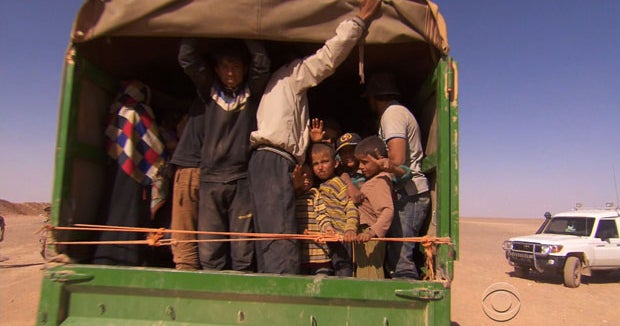 Iraq conflict intensifies refugee crisis in Jordan - CBS News