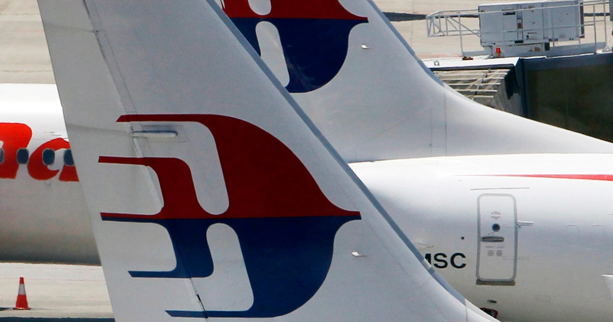 Malaysia Airlines releases names of victims onboard Flight 17 - CBS News