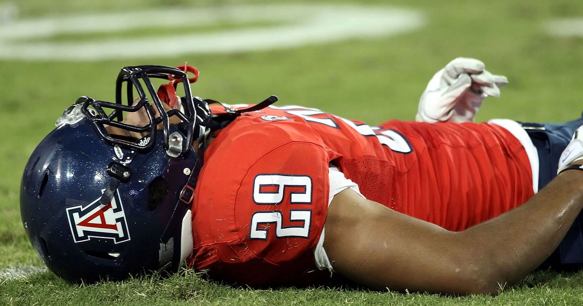 NCAA settles head-injury lawsuit, will changes rules for players - CBS News