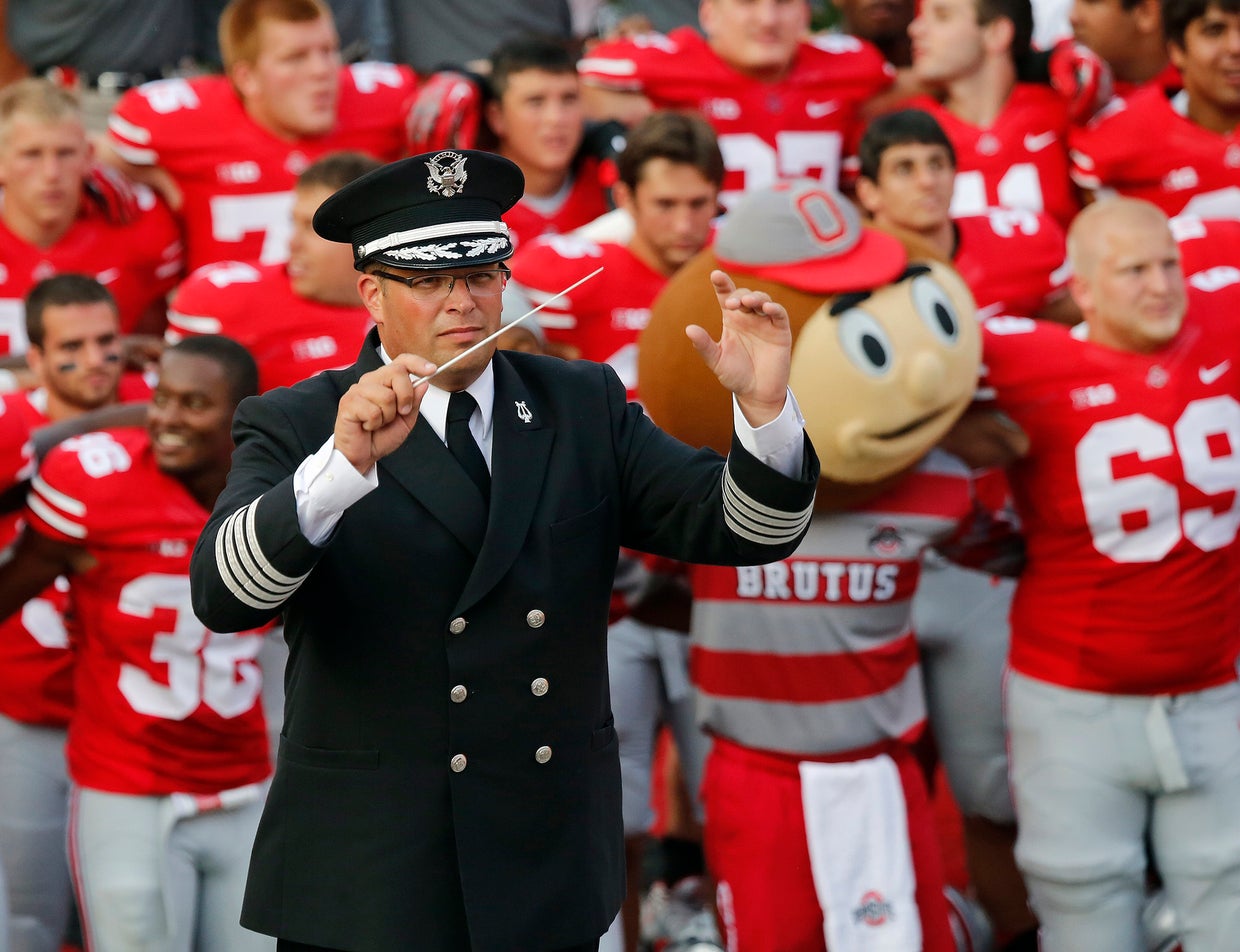 Ohio State band members rally against decision to fire director - CBS News