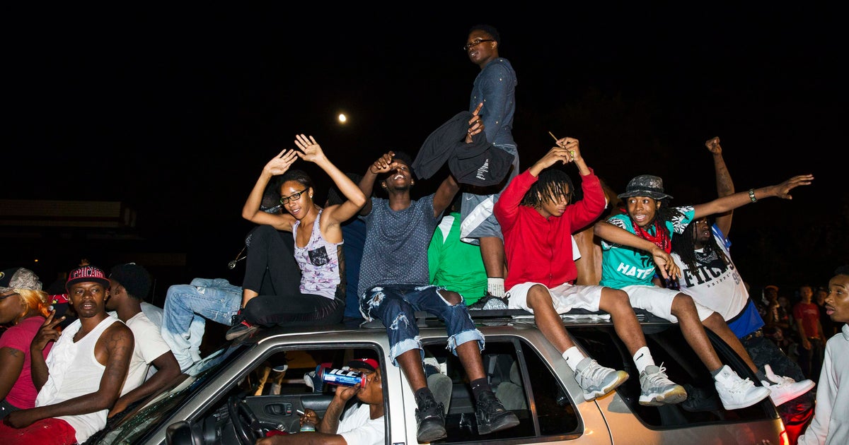 Protests turn almost festive in Ferguson, Missouri - CBS News