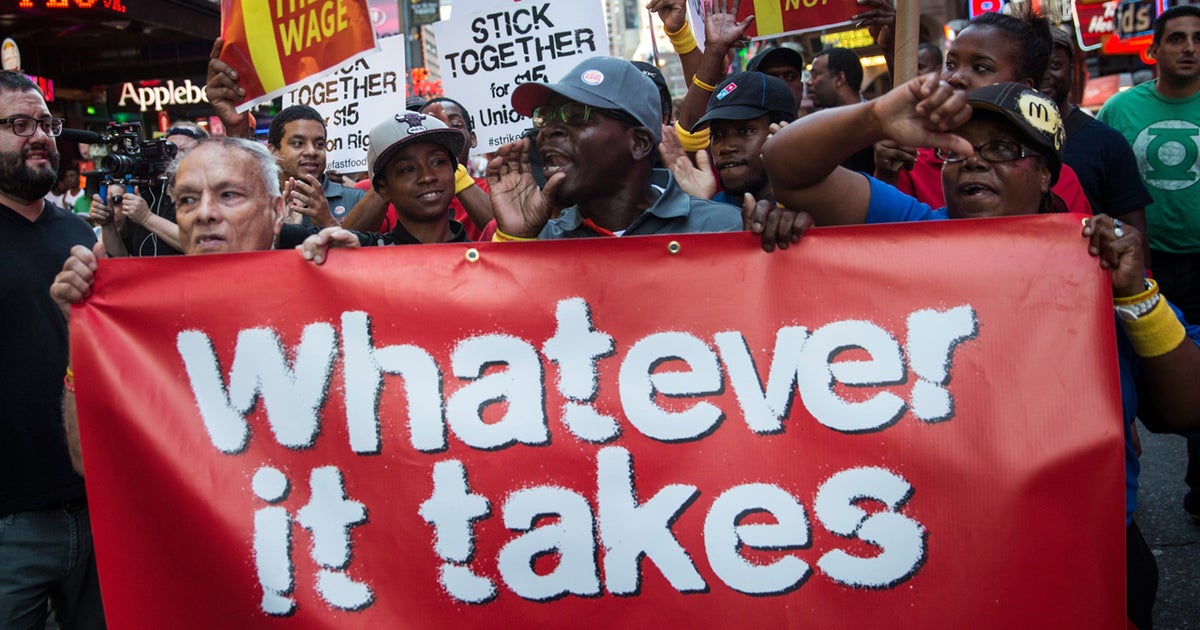 Fast-food workers strike across country, arrests made - CBS News