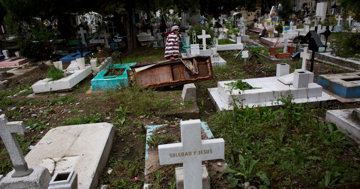 Running out of cemeteries, Mexico City digging up the dead - CBS News