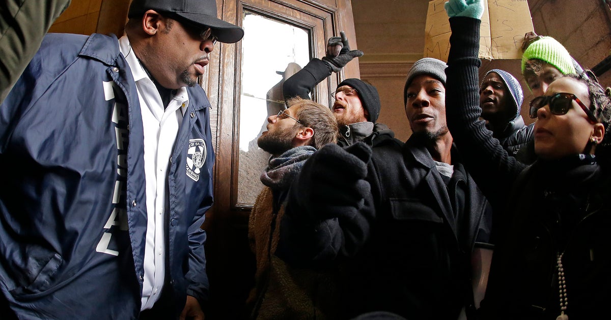 Ferguson fallout Day 3: Protesters storm St. Louis city hall - CBS News